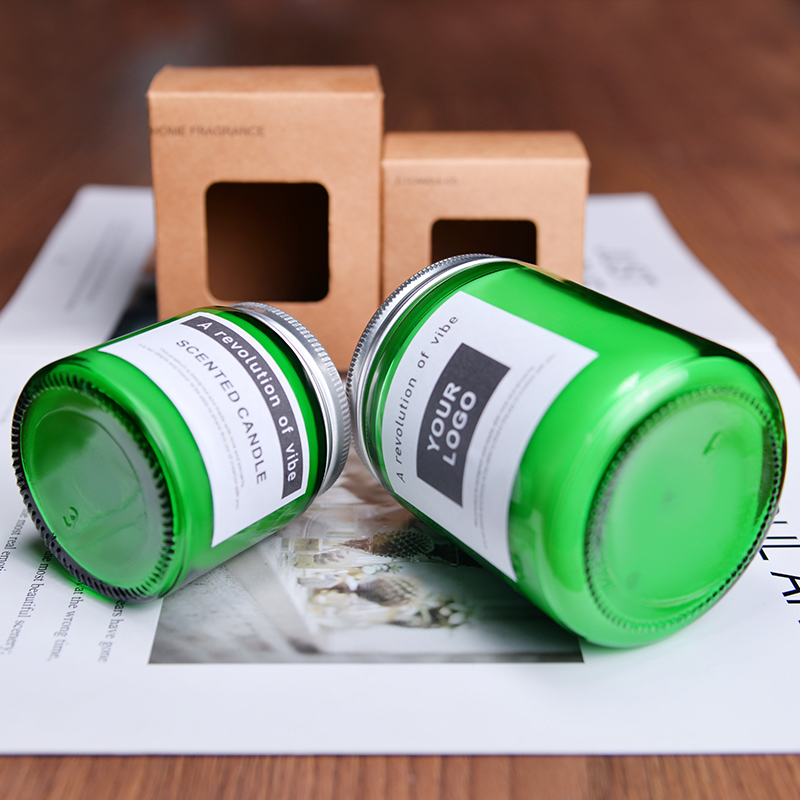 Green glass bottle scented candle