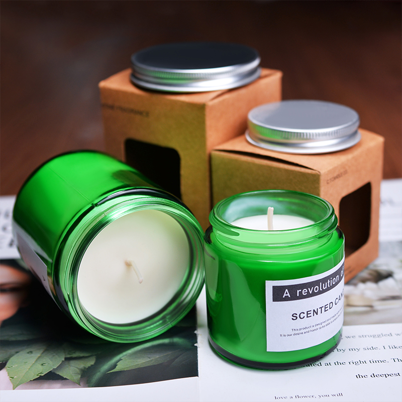 Green glass bottle scented candle